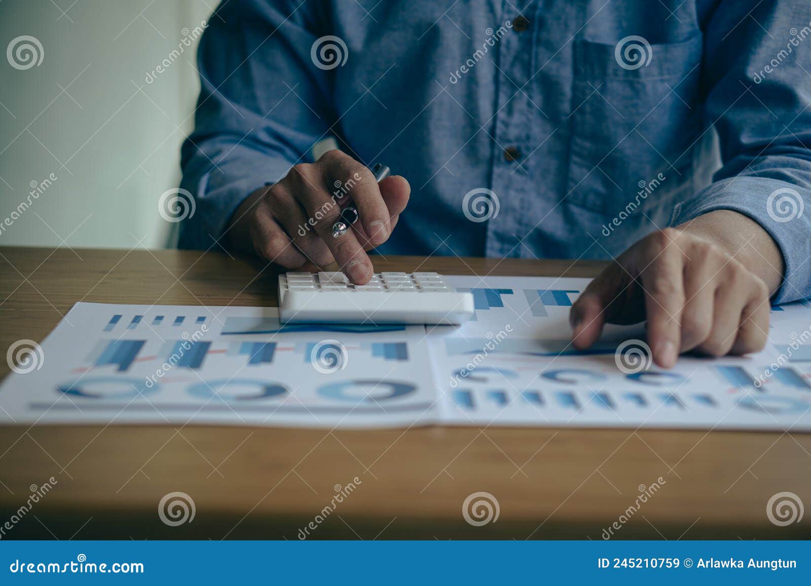 The Accountant`s Hand Holds a Data Graph for Reporting. while Still ...
