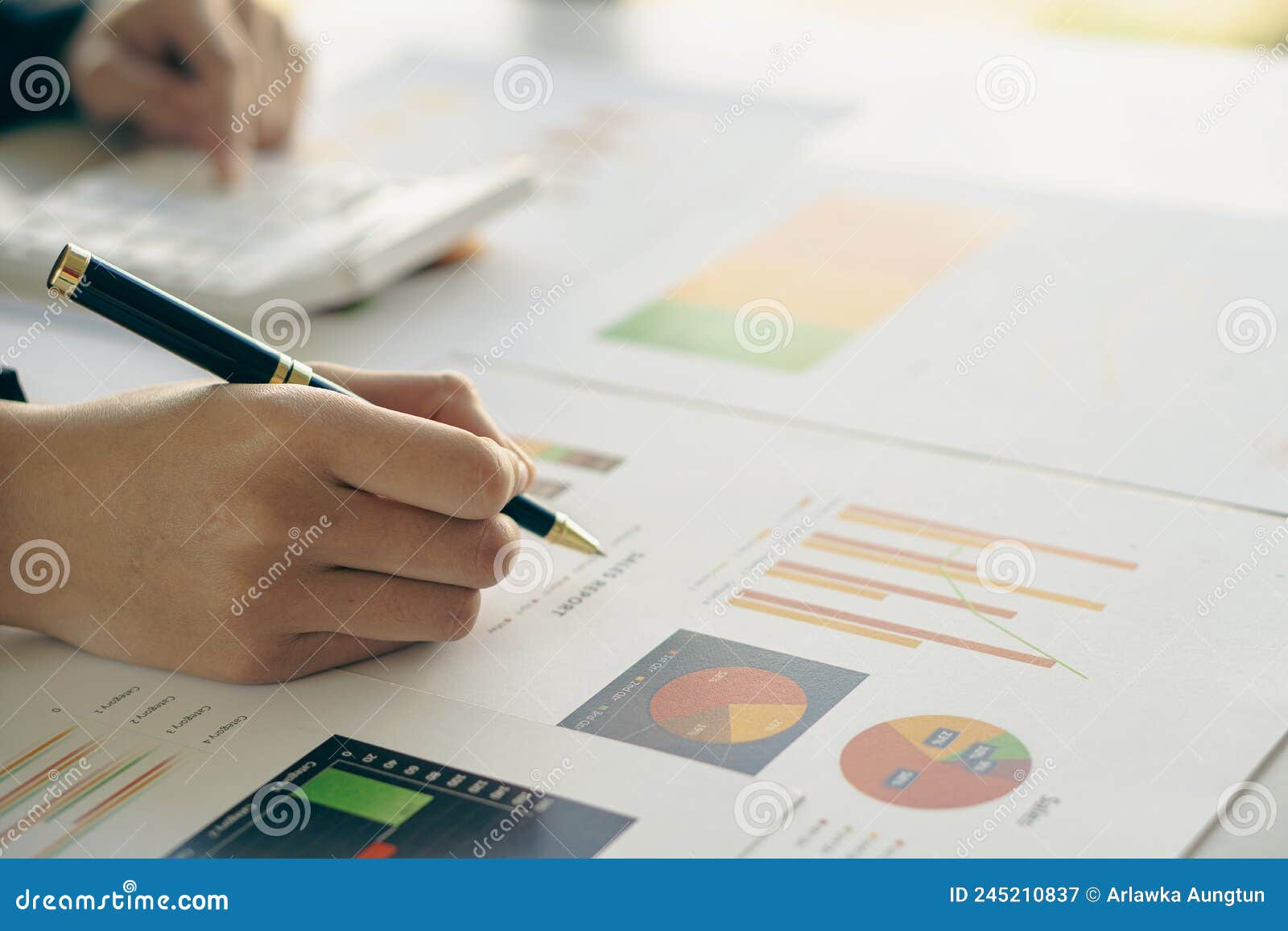 The Accountant`s Hand Holds a Data Graph for Reporting. while Still ...