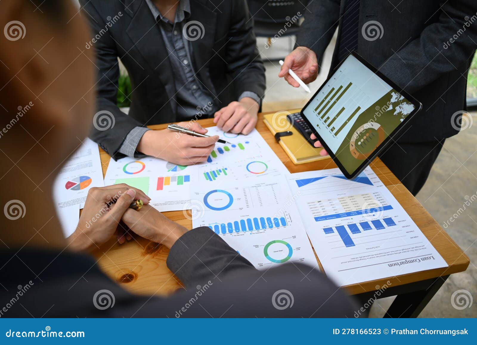 Accountant Team Comparing Corporate Income for Previous Year with ...