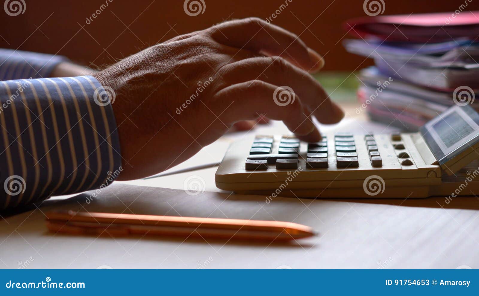 Accountant Using Calculator with Paperwork. Stock Image - Image of ...