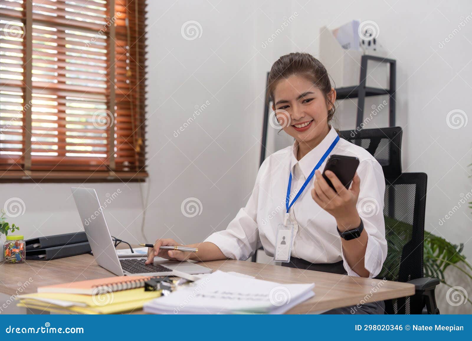 Accountant Using Mobile Phone at Office, Analyzing Business Document ...