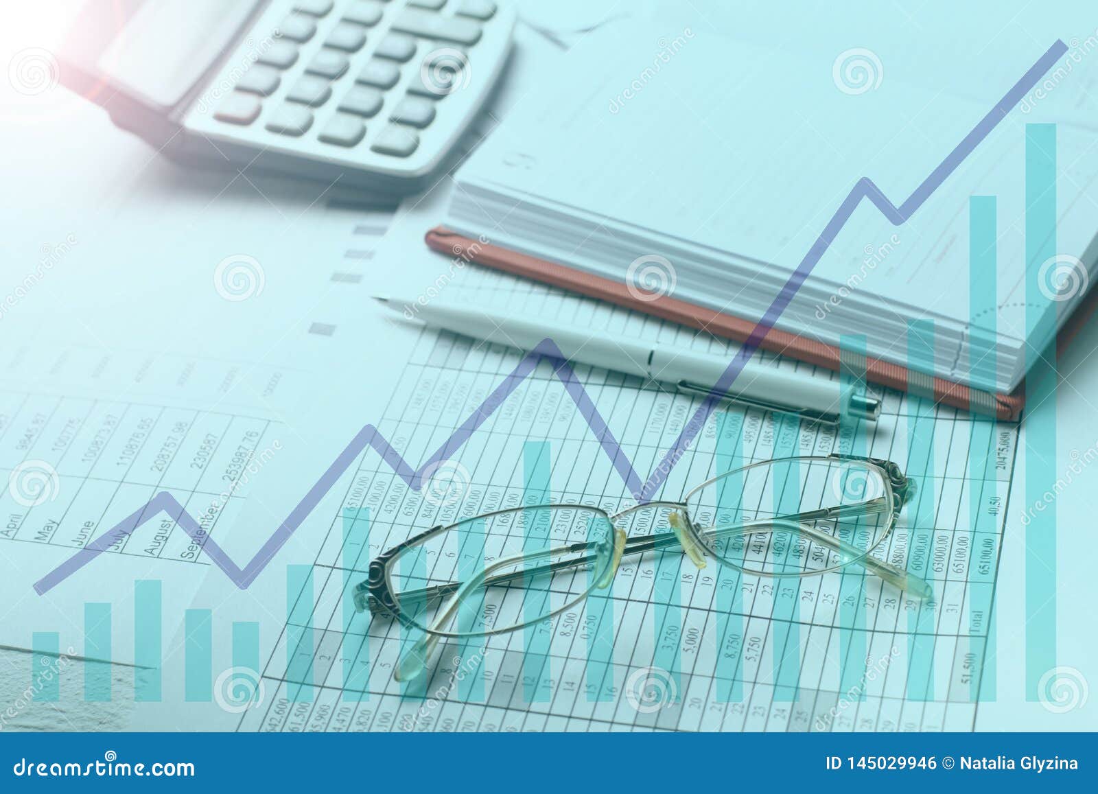 Accountant Work Table with Calculator, Charts and Pen Stock Photo ...