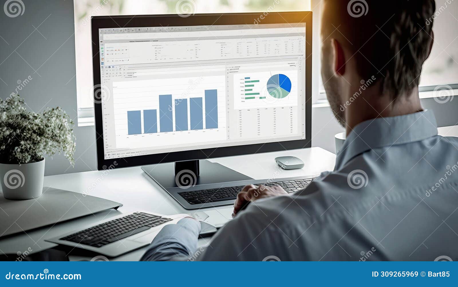 Accountant Working on Financial Report and Charts with Spreadsheet ...