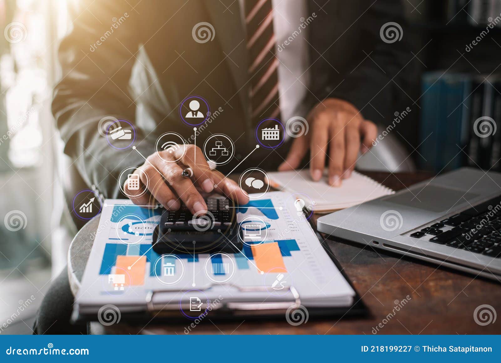 Accountant Working on Laptop Computer with Business Document, Graph ...