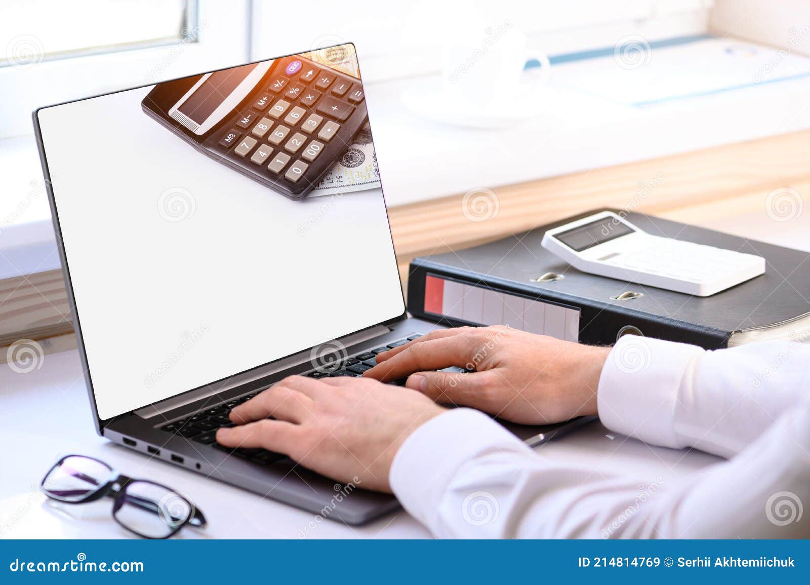 . Accounting Courses. on the Table There is a Computer and a Folder ...