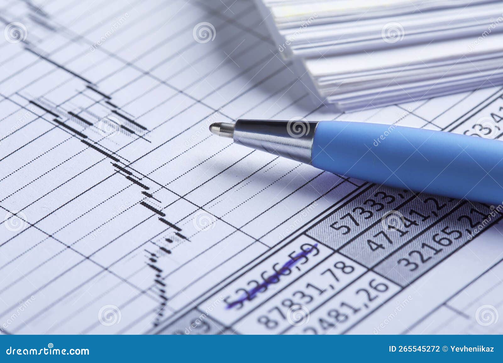 Accounting Document with Pen, Share Listing and Checking Financial ...