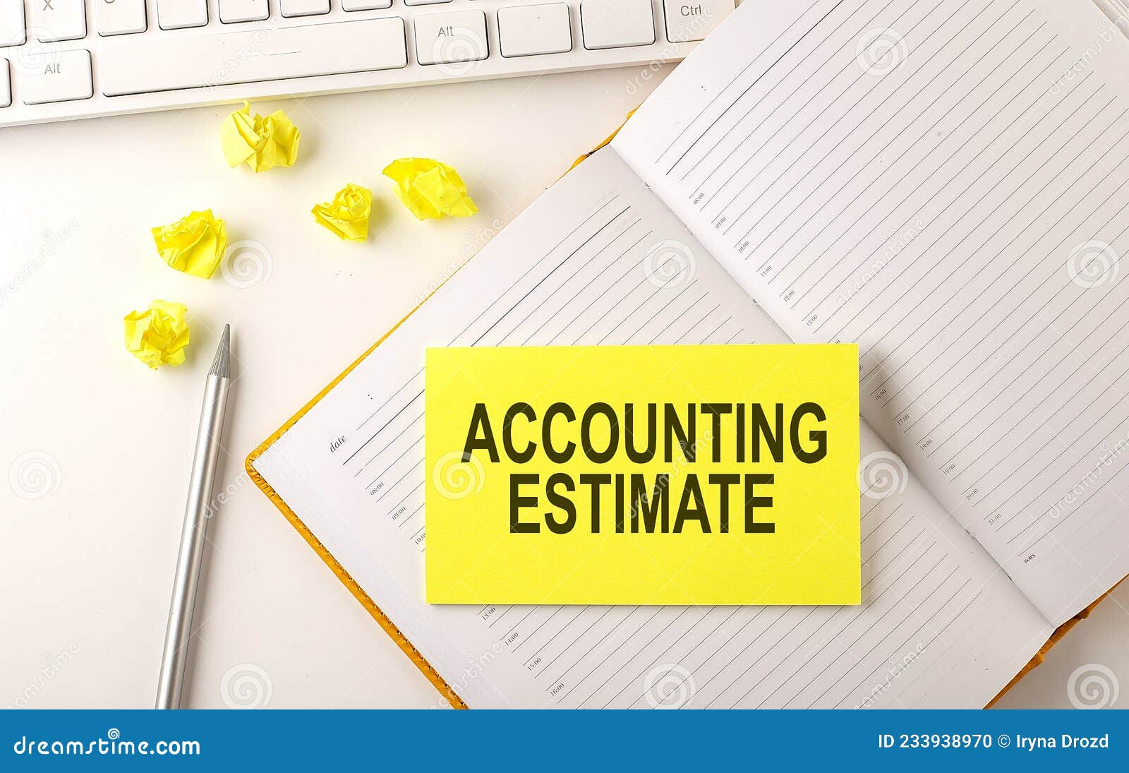 ACCOUNTING ESTIMATE Text on Sticker on the Diary with Keyboard and ...