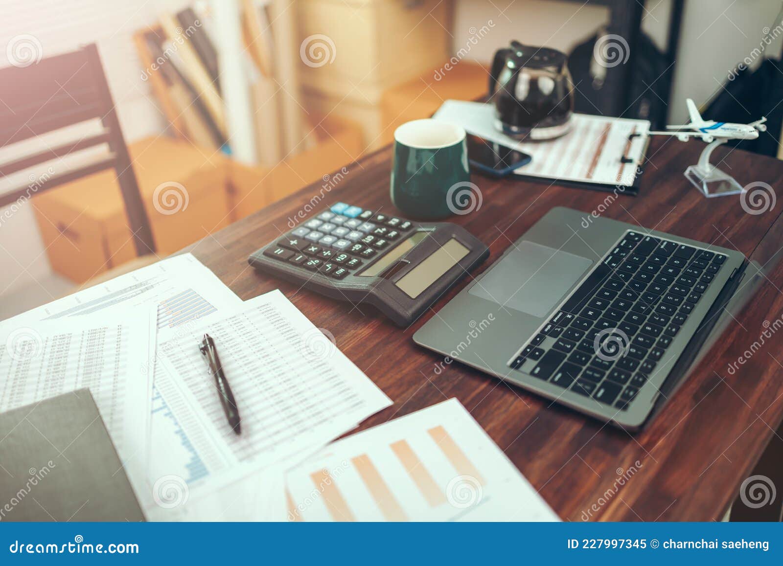 Accounting Woking with Data Sheet on the Office Desk. Calculator with ...