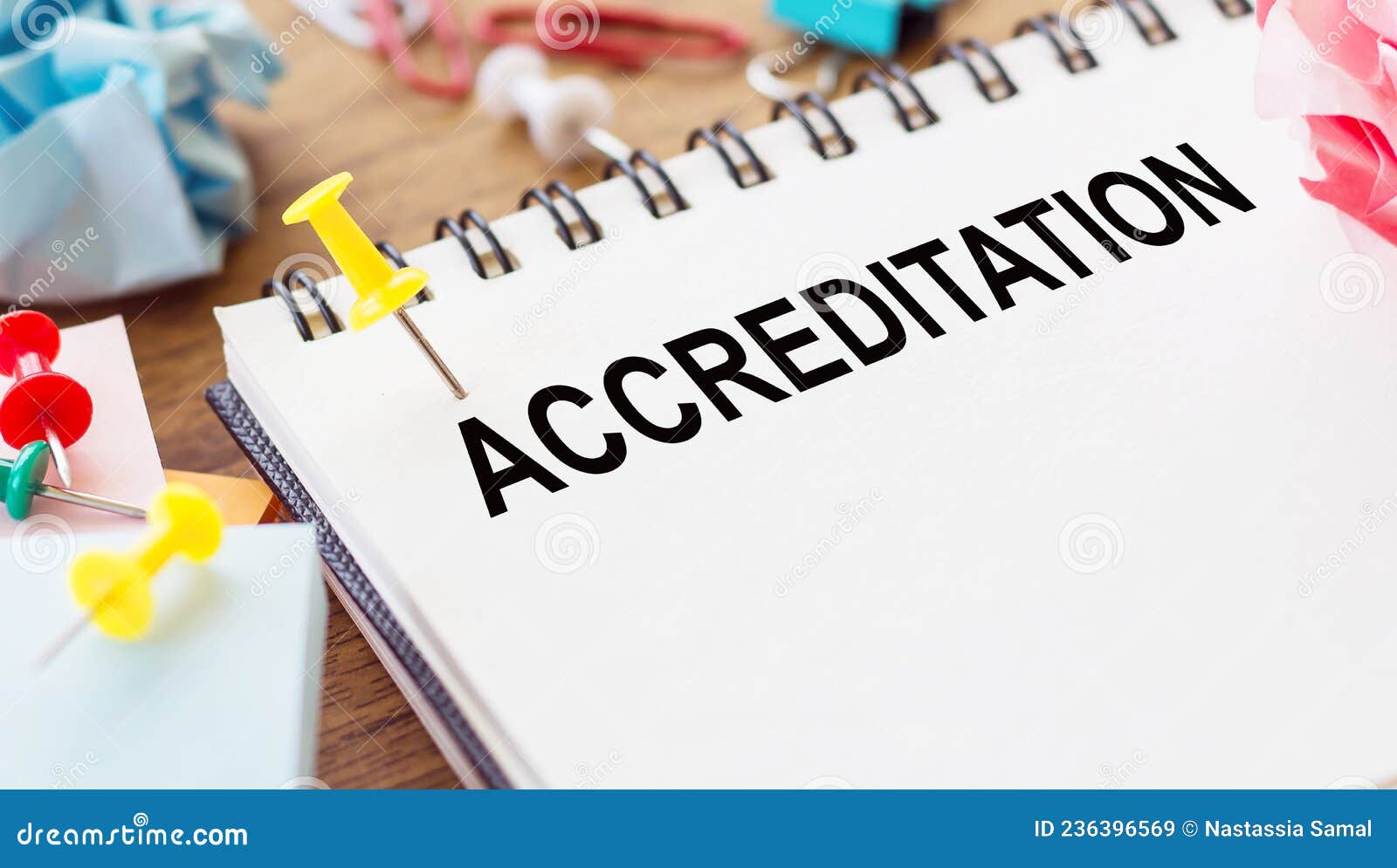 ACCREDITATION - Text on a Notepad with Wrinkled Paper and Paper Needles ...