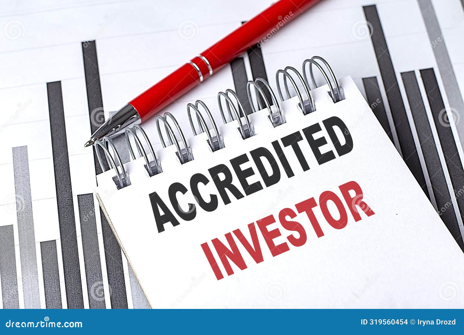 ACCREDITED INVESTOR Text on Notebook on Chart with Pen Stock Photo ...
