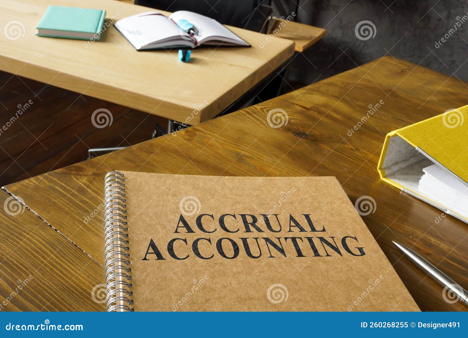 Accrual Accounting Guide Near a Folder on the Table. Stock Image ...