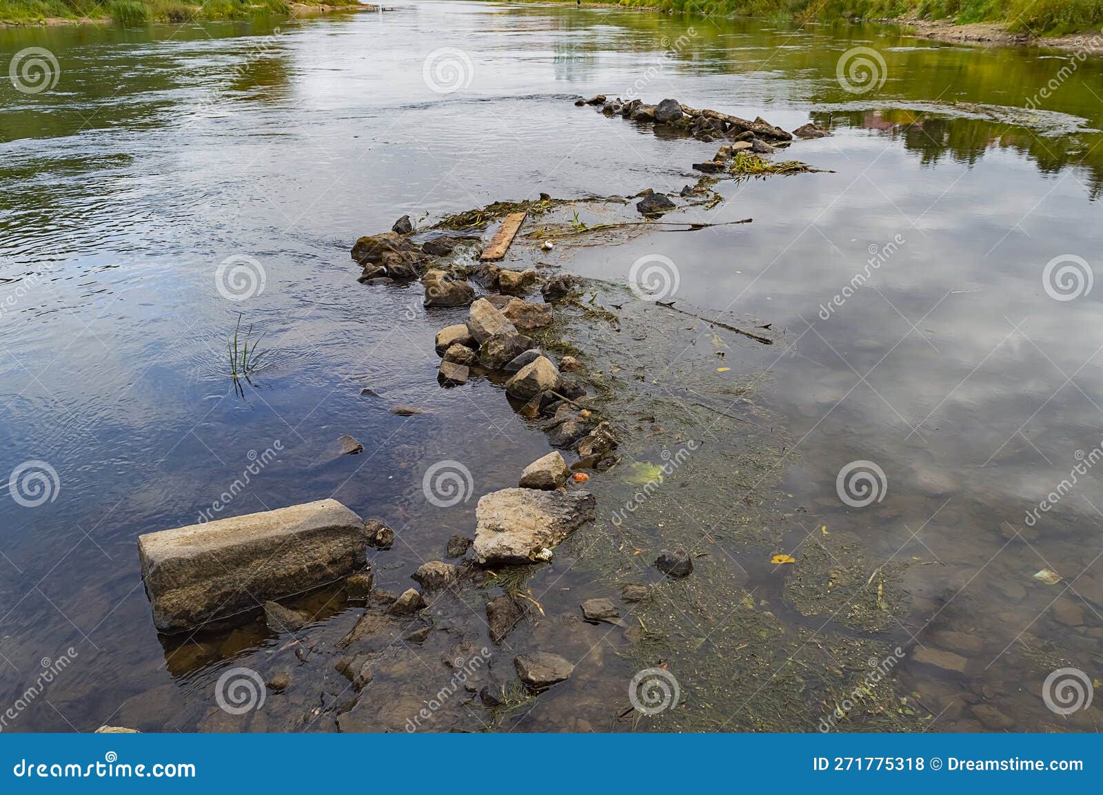 Accumulation of Waste in the River. Garbage and Empty Aluminum Can ...
