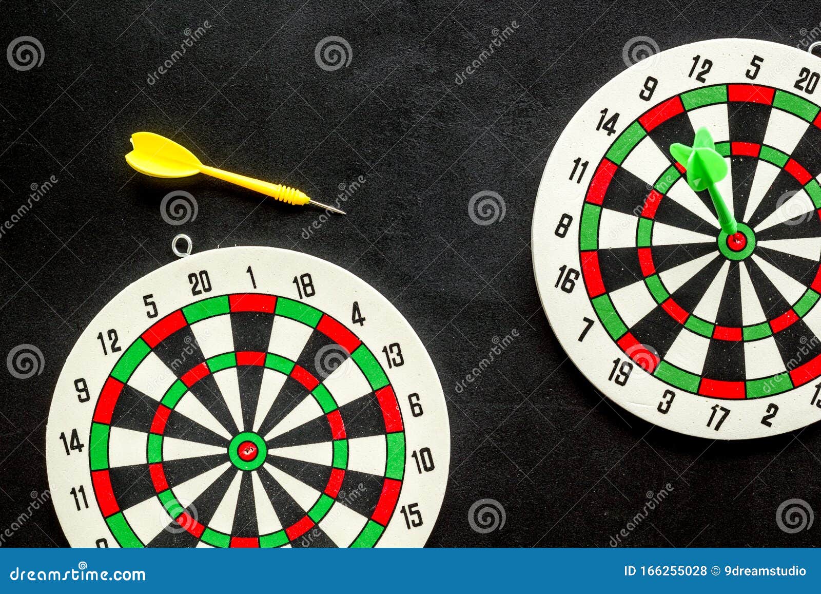 Accuracy of Precision Concept. Dartboard and Arrows on Black Background ...