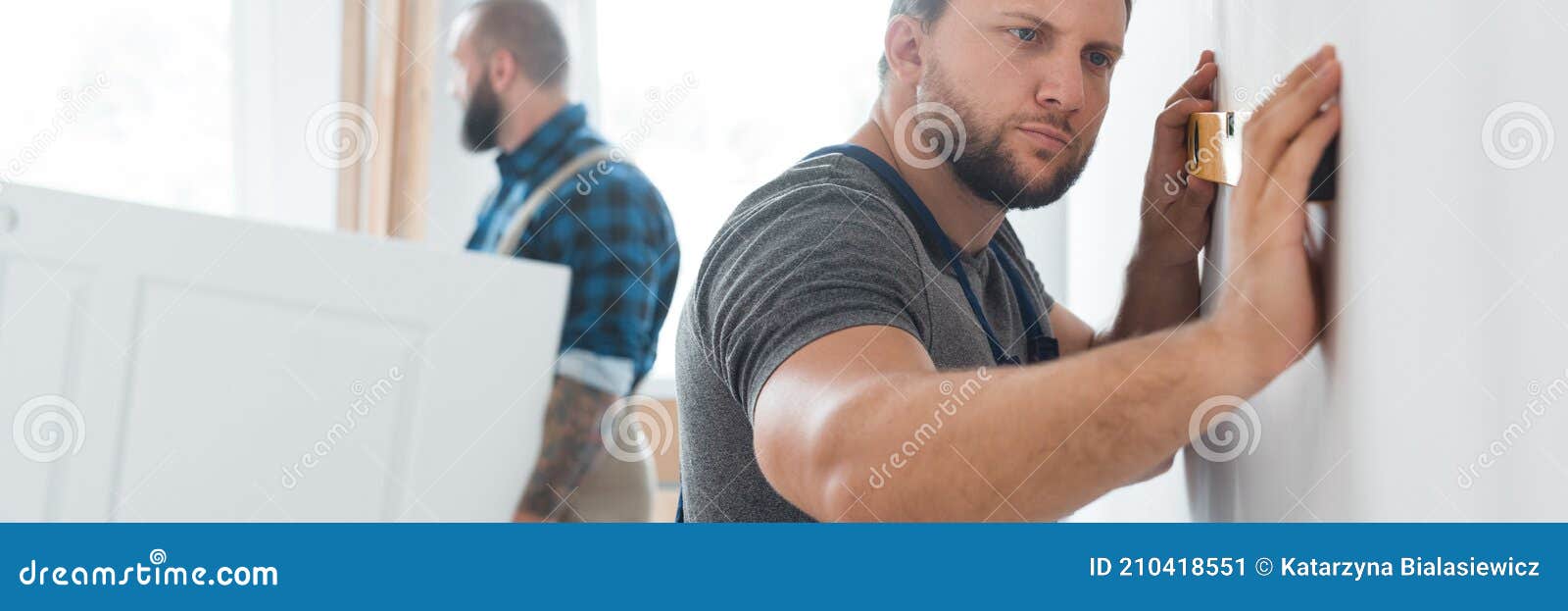 Accurate young builder stock image. Image of industry - 210418551