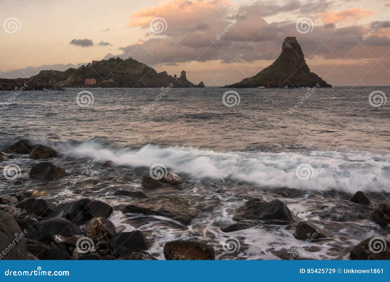 Acitrezza stock image. Image of coastline, clouds, destination - 85425729