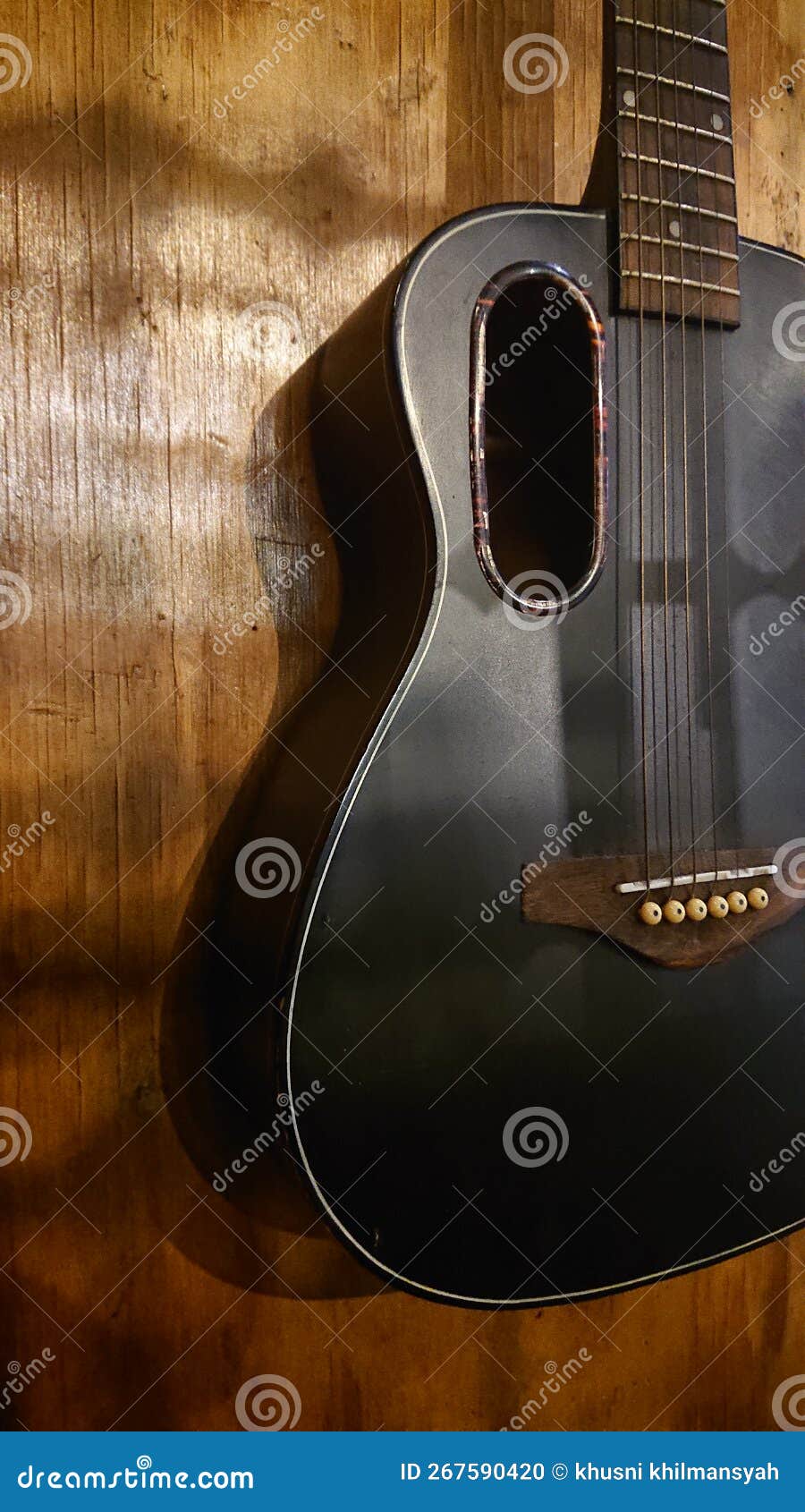 Acoustic Guitar with an Oval Hole in the Side of the Tube Stock Photo ...