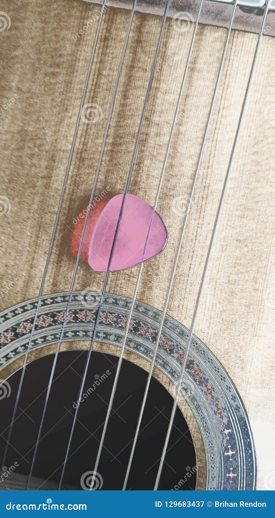 Acoustic Guitar with a Pink Plectrum Stock Image - Image of reflex ...