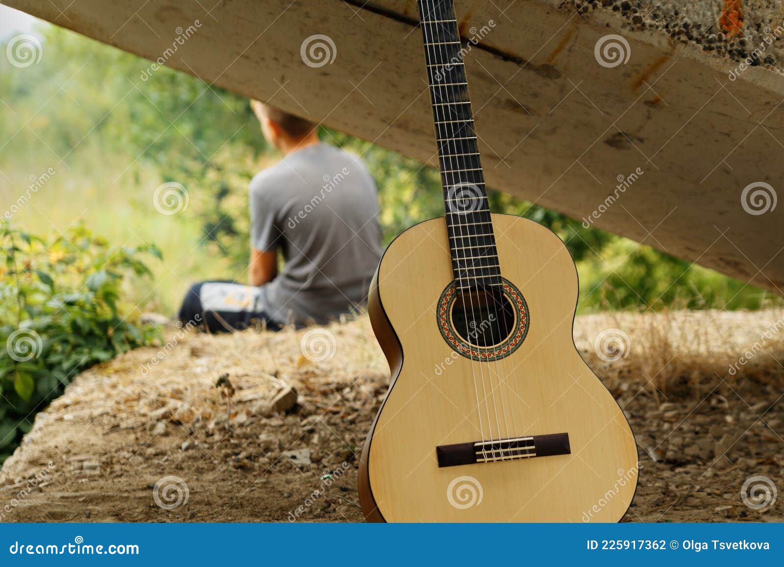 Acoustic Guitar, Six Strings. Boy is Sitting on Raised Platform Stock ...