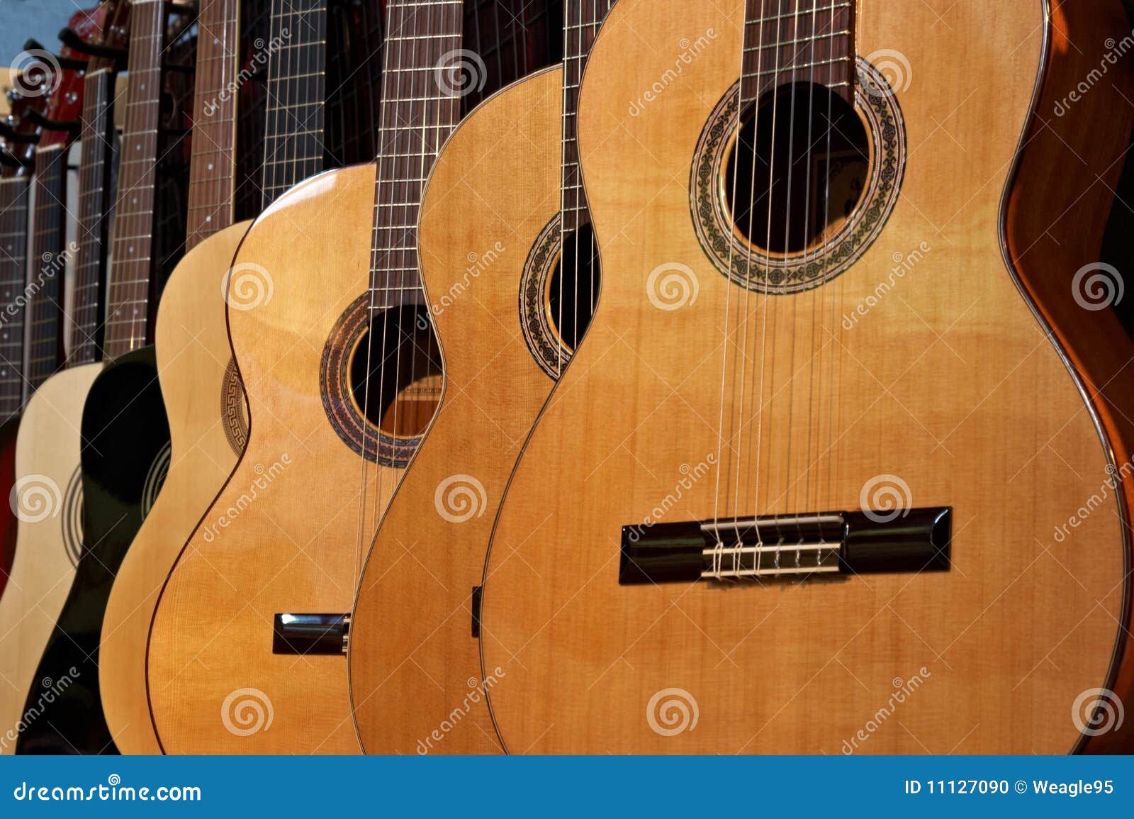 Acoustic Guitars Hanging From The Ceiling Stock Photo | CartoonDealer ...