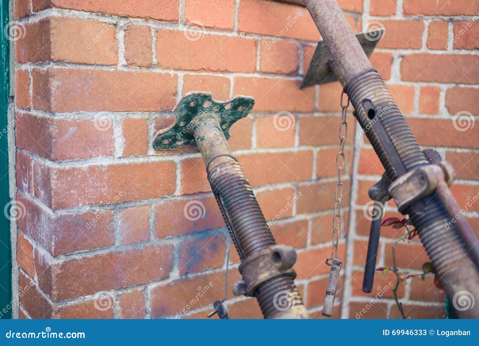 Acro Supports Leaning Against Brick Wall Stock Image - Image of ...
