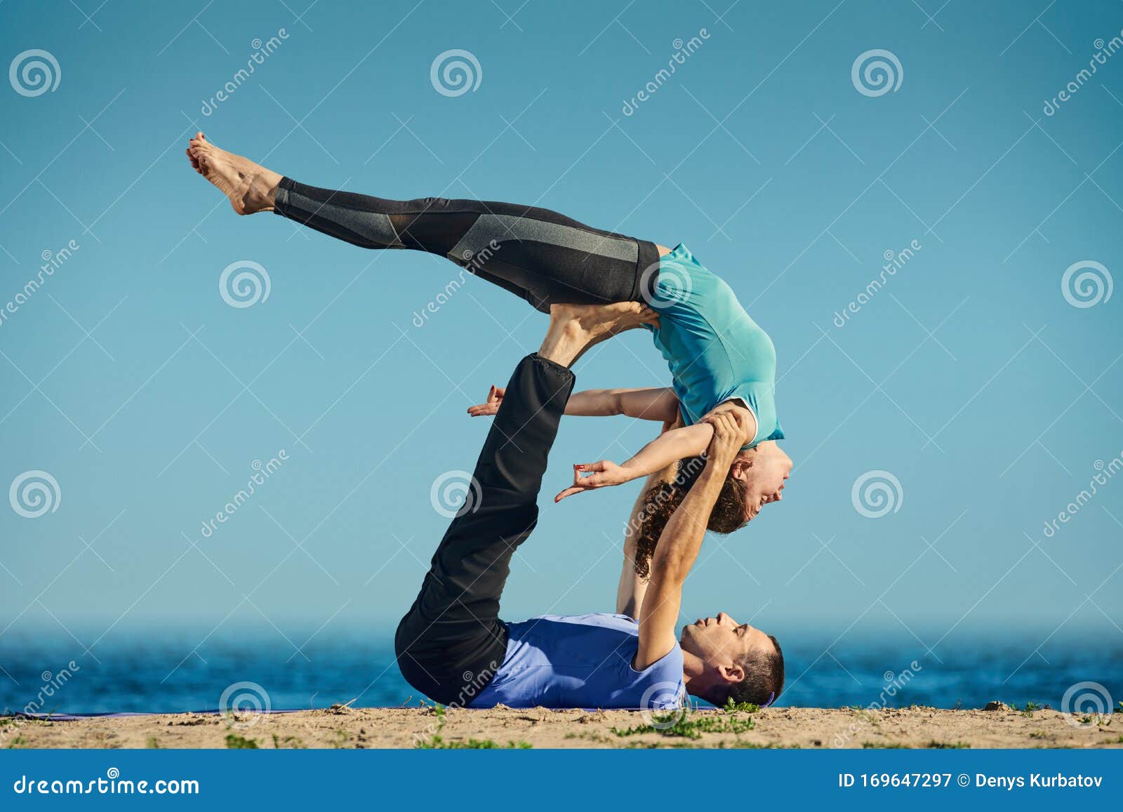 Acro yoga in pair stock image. Image of acrobatics, aerobics - 169647297