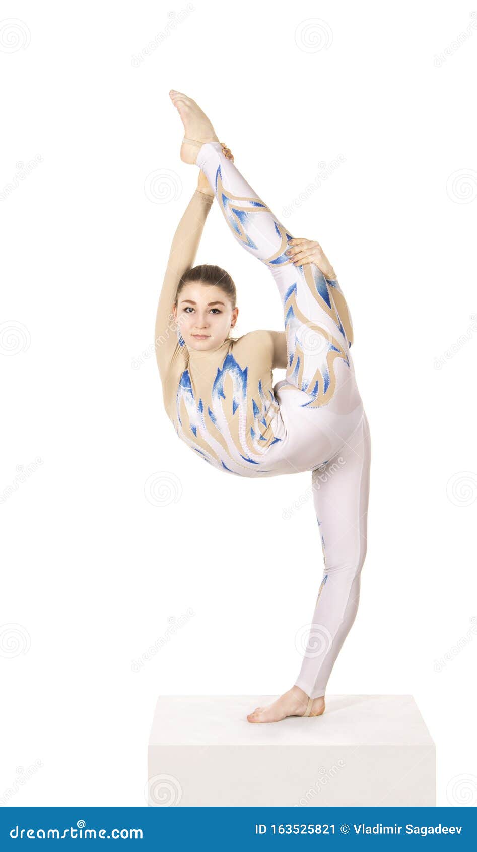 Acrobat Doing Gymnastics, a Young Circus Artist in a White and Blue ...