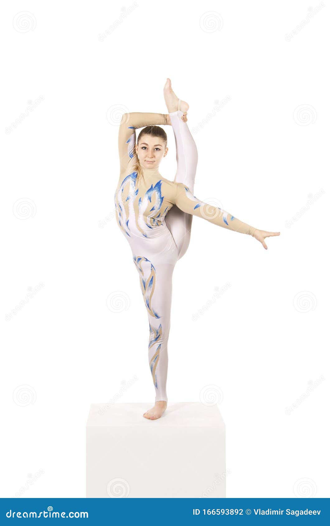 Acrobat Doing Gymnastics, a Young Circus Artist in a White and Blue ...