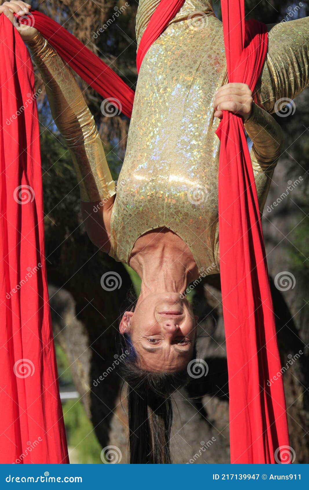 Acrobat Doing Moves in a Park Stock Image - Image of outdoors, acrobat ...
