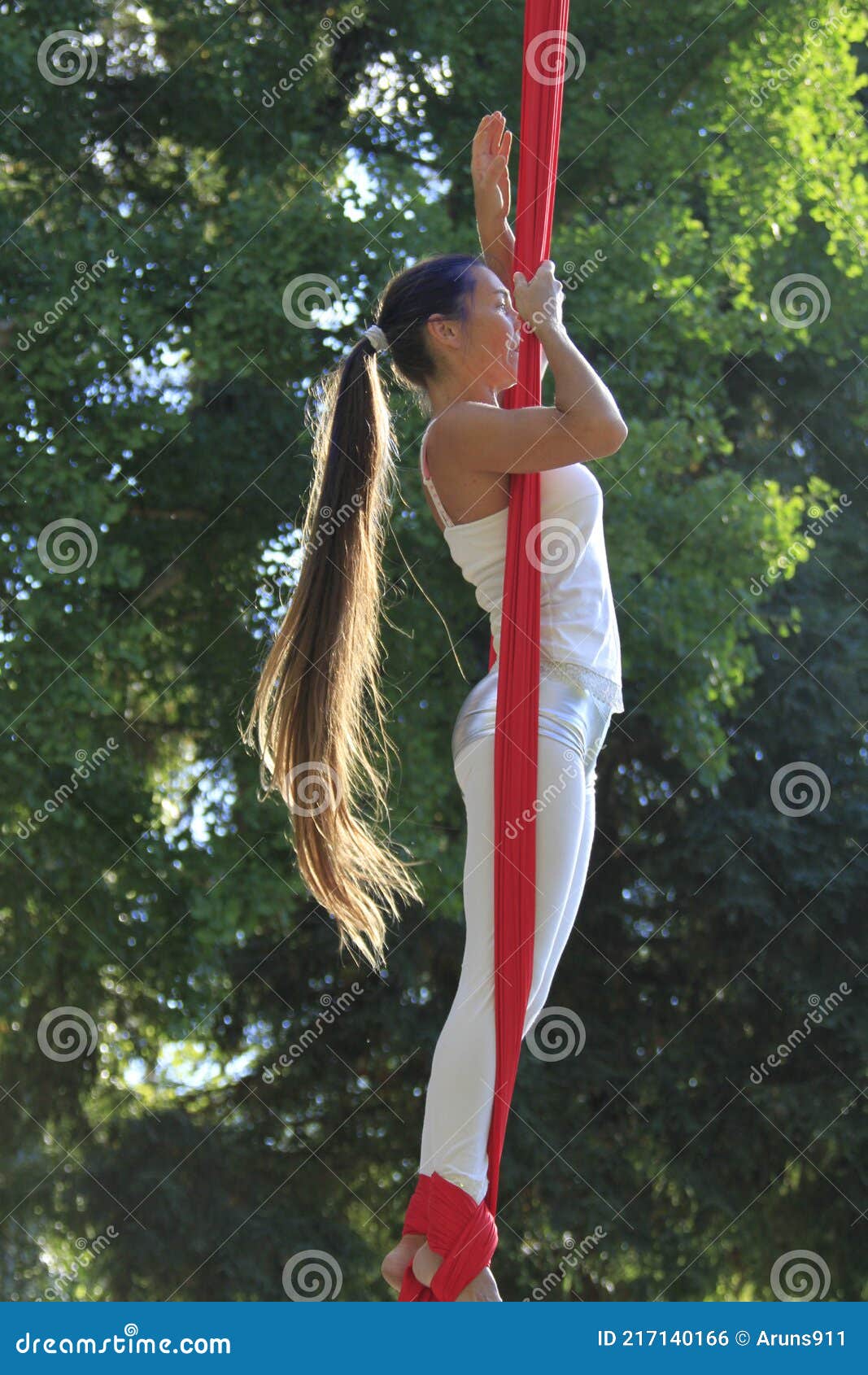 Acrobat Doing Moves in a Park Stock Photo - Image of italian, outfit ...