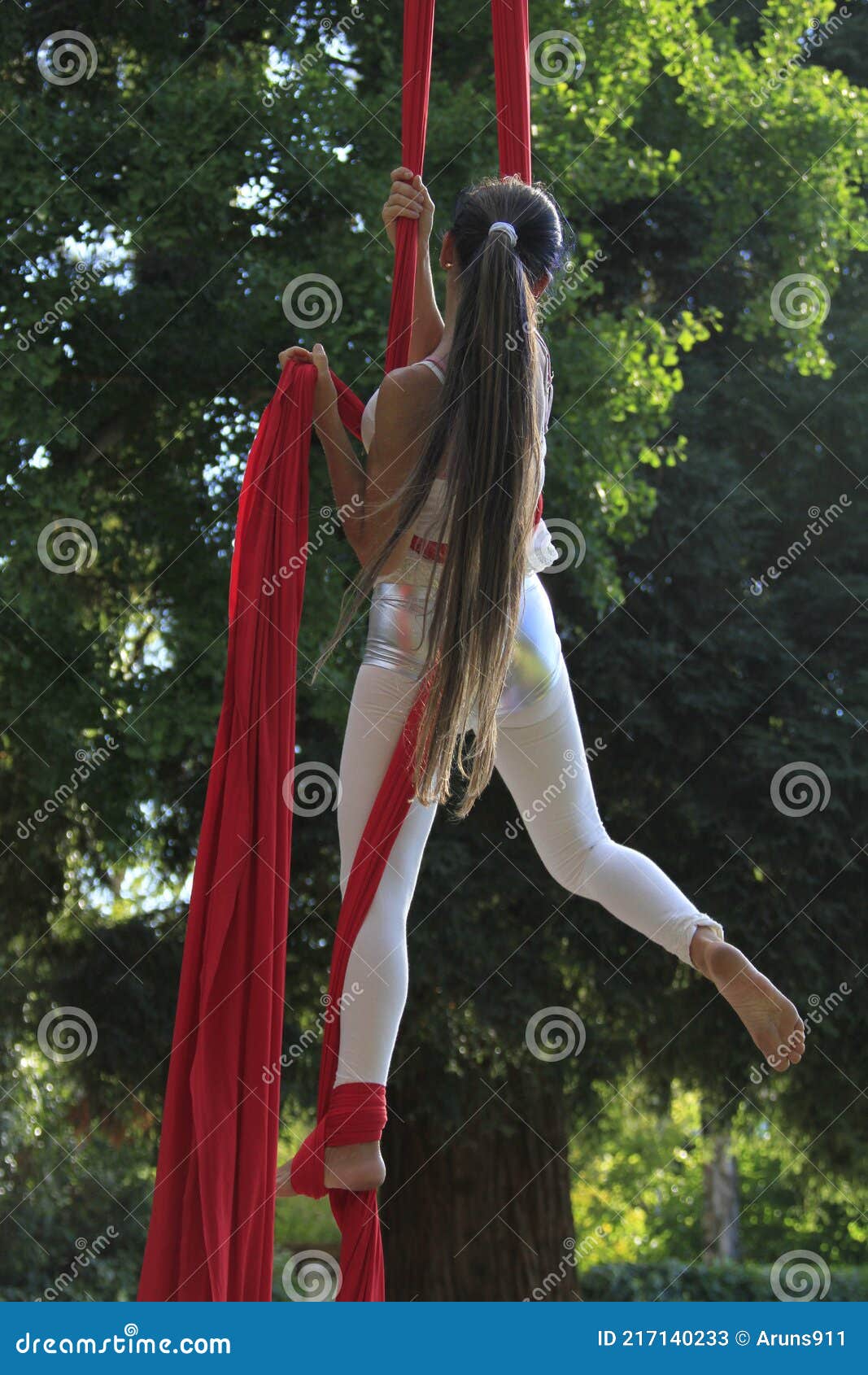 Acrobat Doing Moves in a Park Stock Image - Image of park, foliage ...