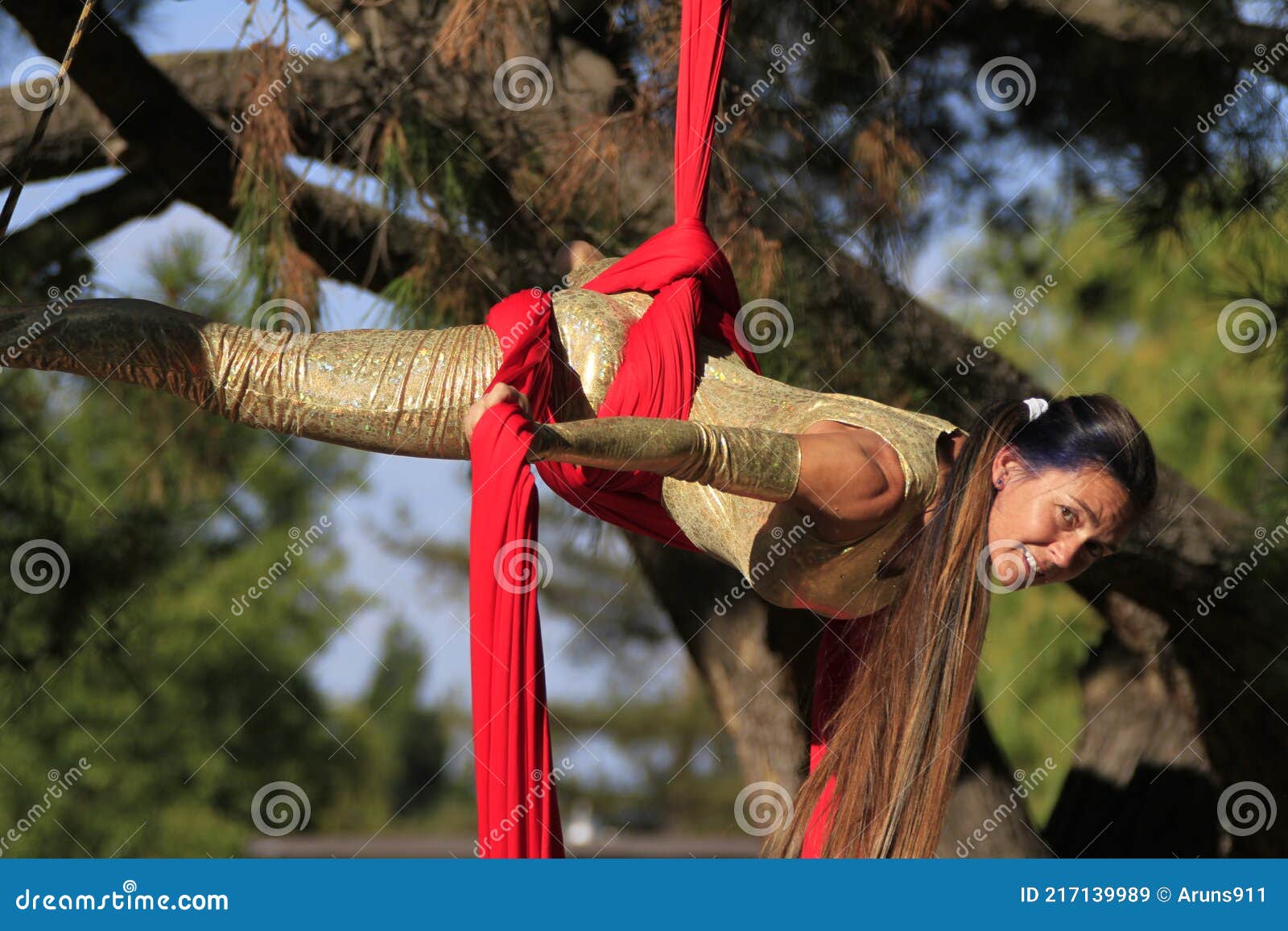 Acrobat Doing Moves in a Park Stock Image - Image of outdoors, acrobat ...