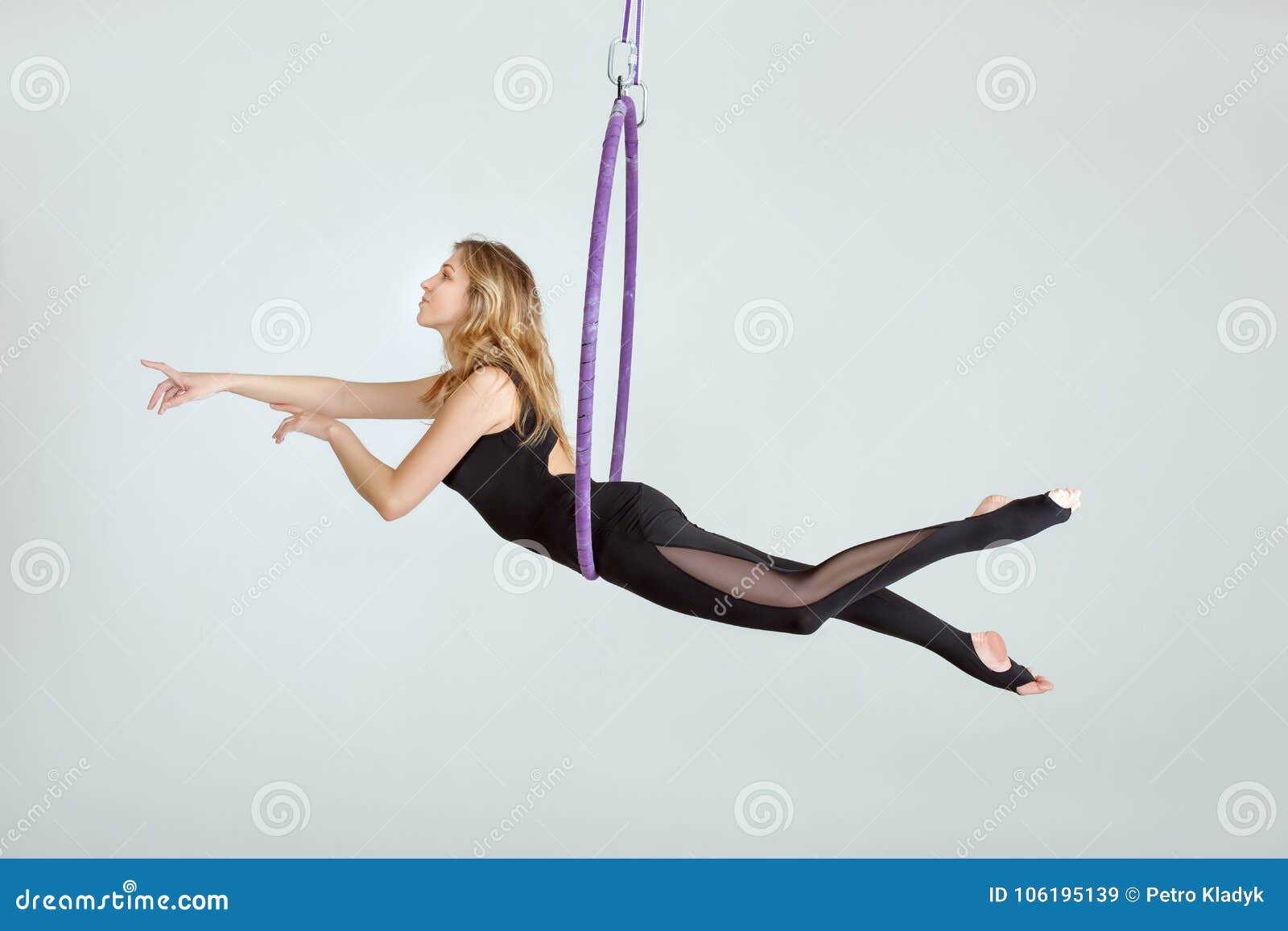 Acrobat hung on hula Hupe. stock image. Image of beautiful - 106195139