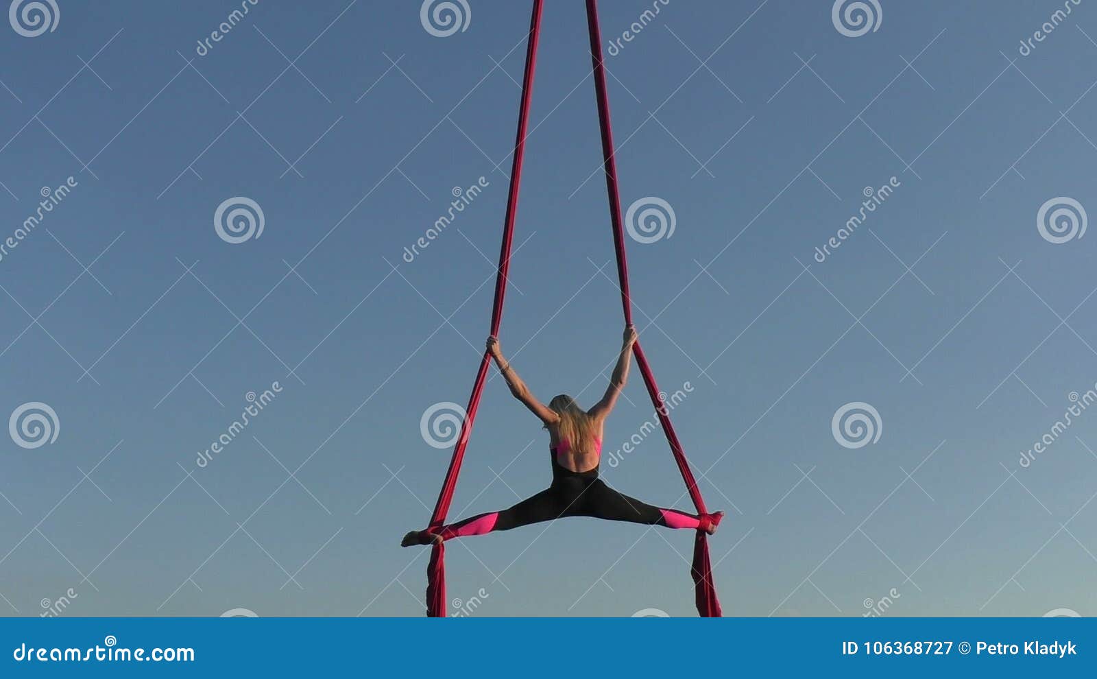 Acrobat in the Sky Does Poses. Stock Video - Video of balance, athlete ...