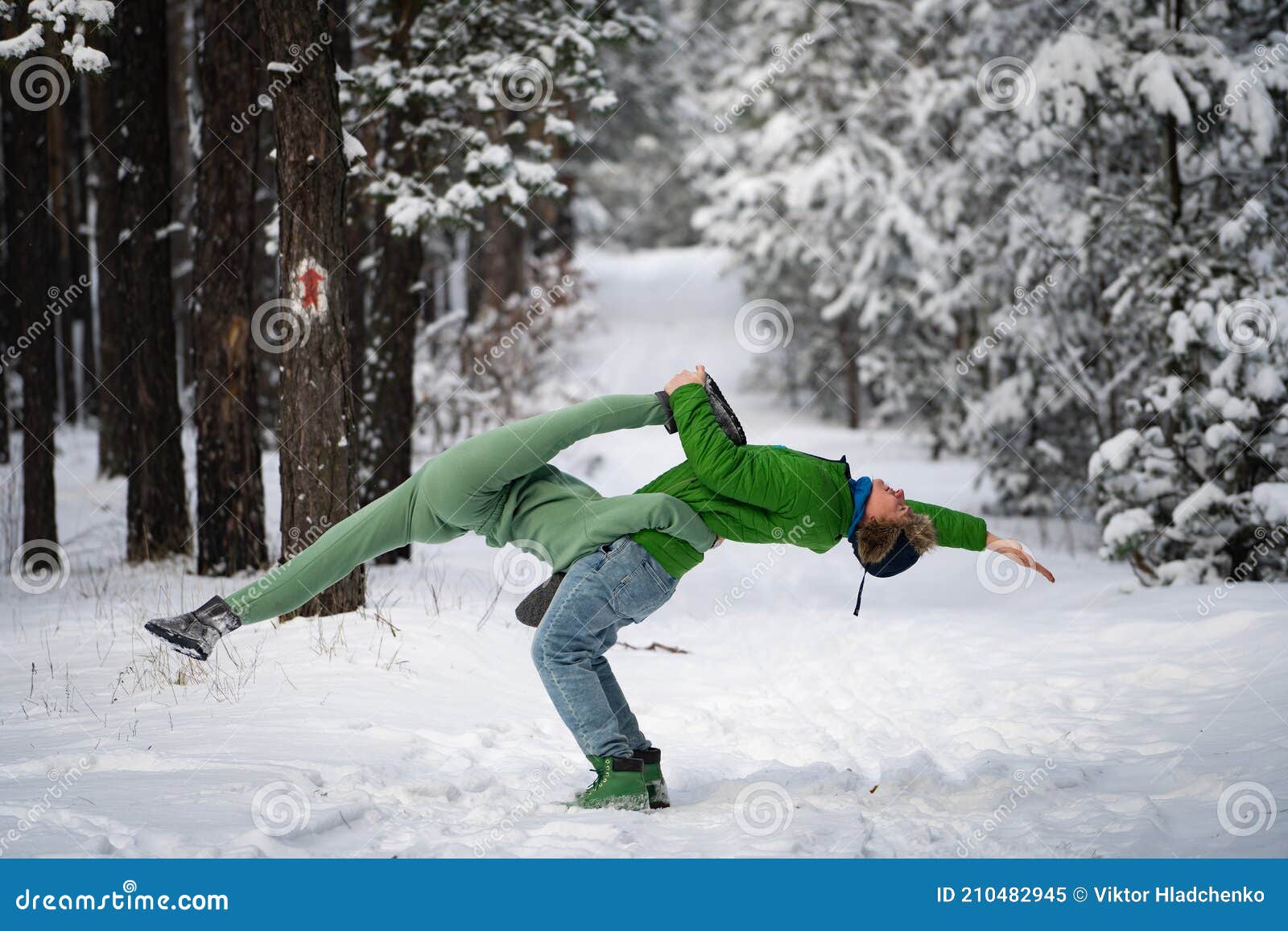 Acrobatic Duo Making Nice Pose on the Huge Windows Background with ...