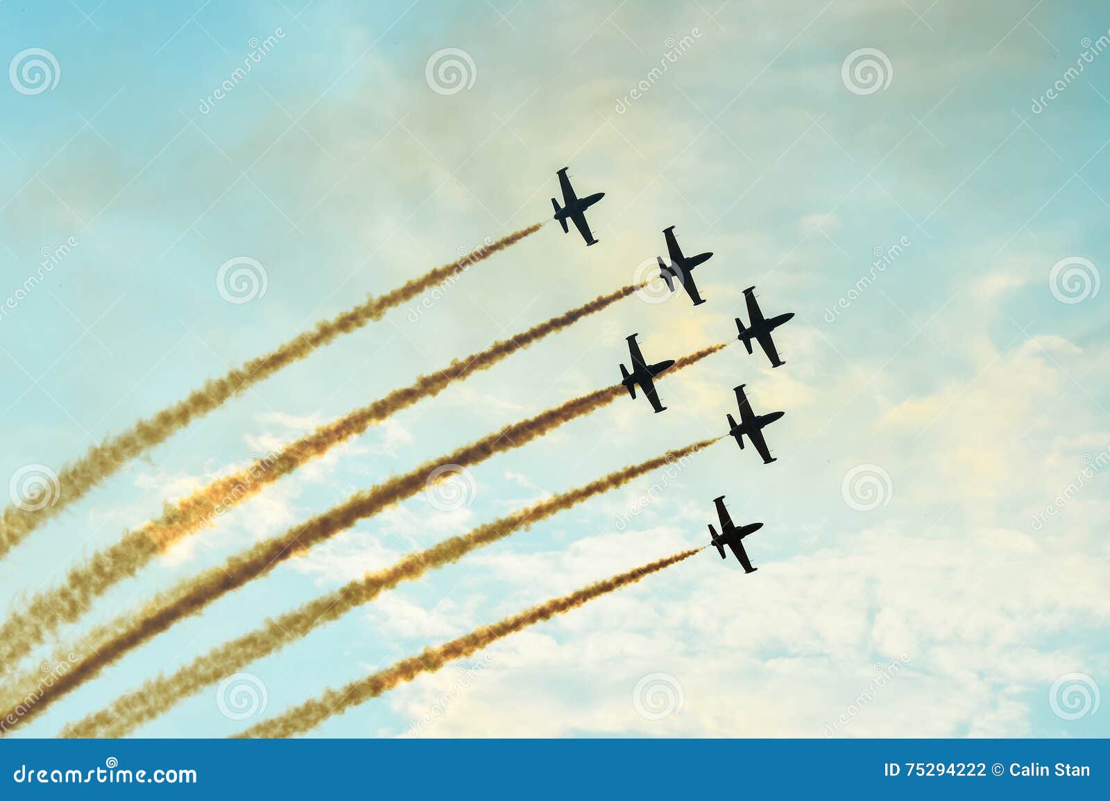 Acrobatic Planes Doing Acrobatics at an Airshow Flying at Sunset ...
