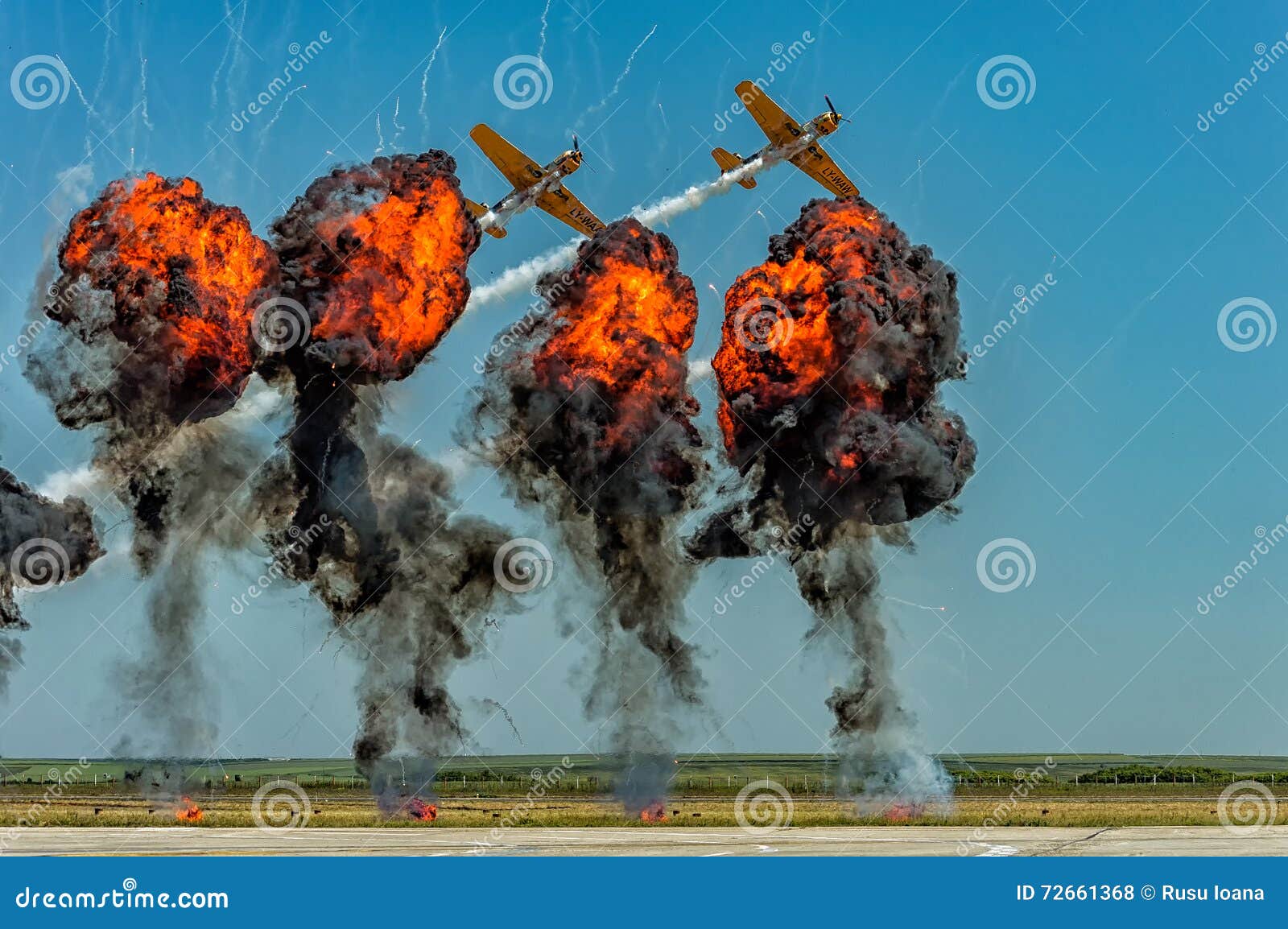 Acrobatic Planes Flying through Smoke Editorial Stock Photo - Image of ...