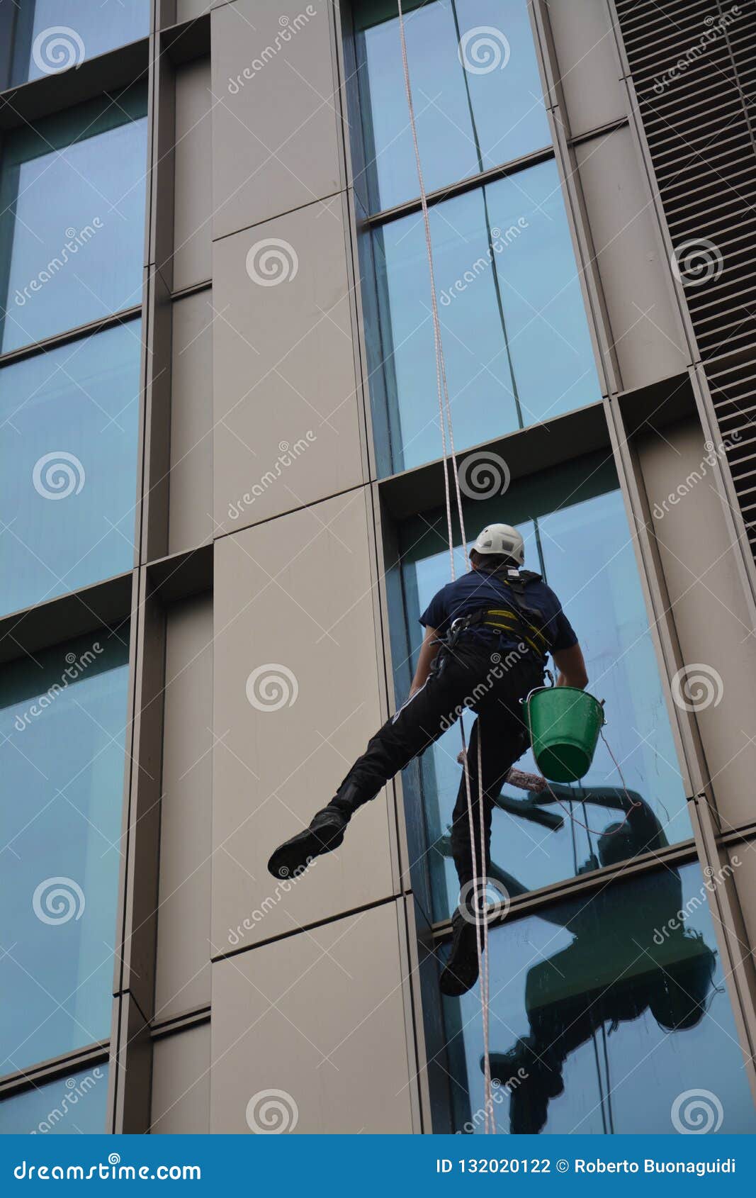 Acrobatics for Cleaning the Windows of a Skyscraper Editorial ...