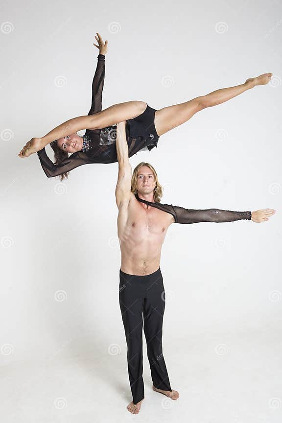 Acrobats perform stock photo. Image of muscle, sculptured - 33314128