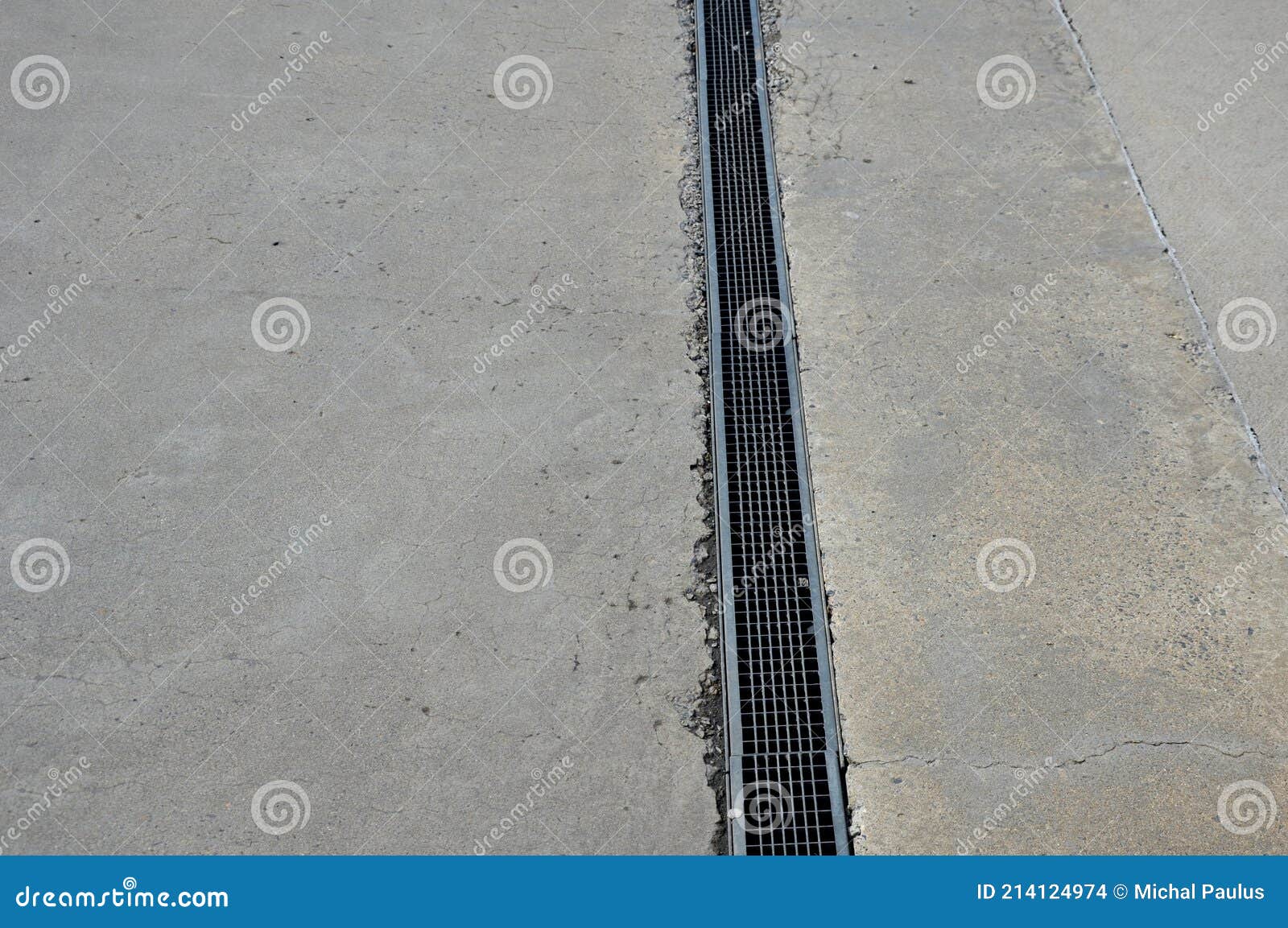 Across the Path There is a Channel with a Metal Grid for Drainage ...