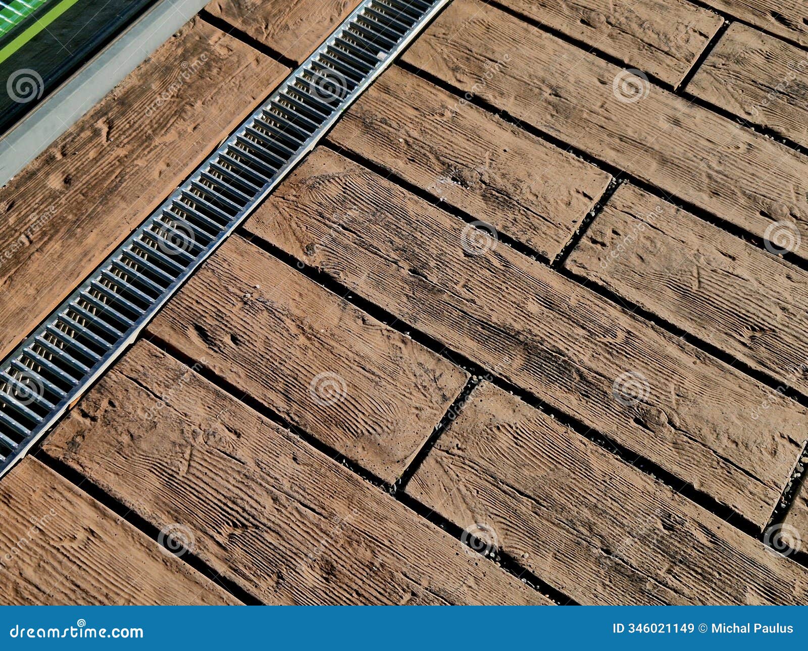 Across the Path There is a Channel with a Metal Grid for Drainage ...