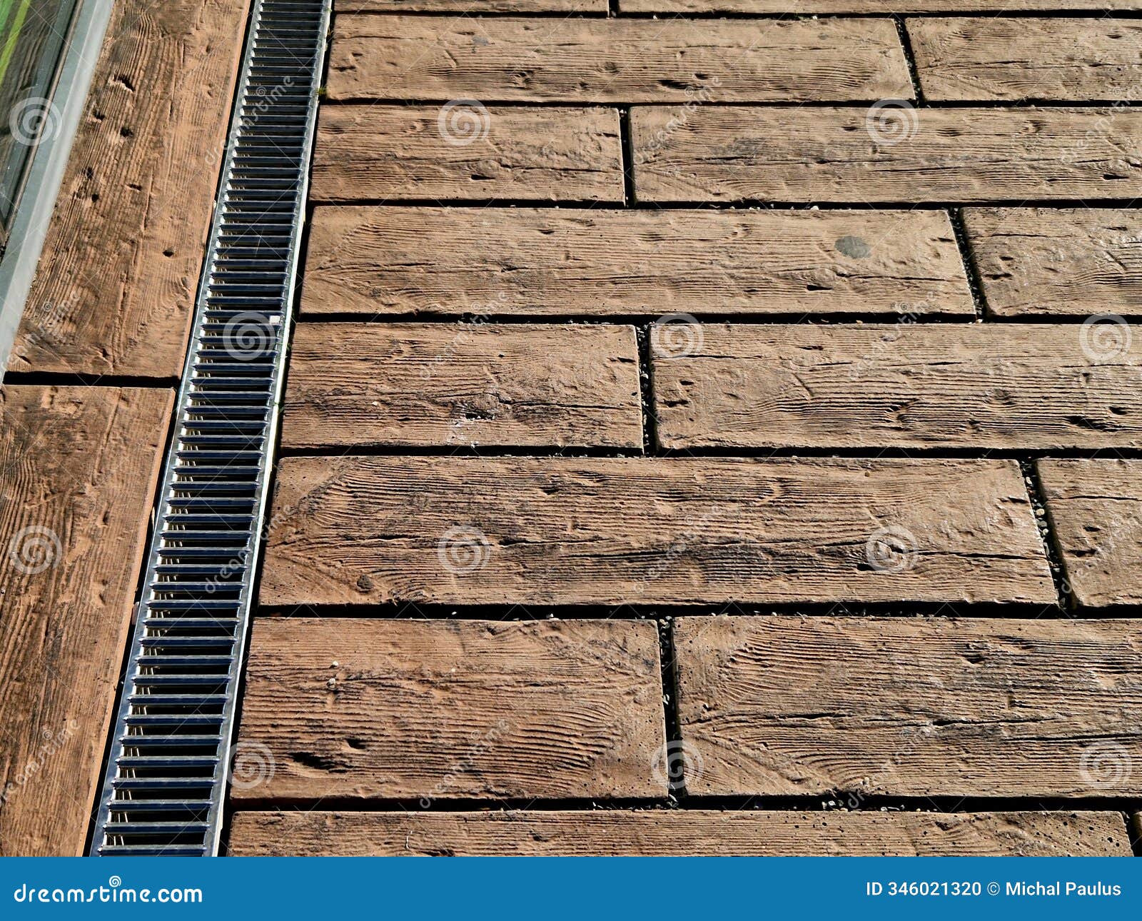 Across the Path There is a Channel with a Metal Grid for Drainage ...