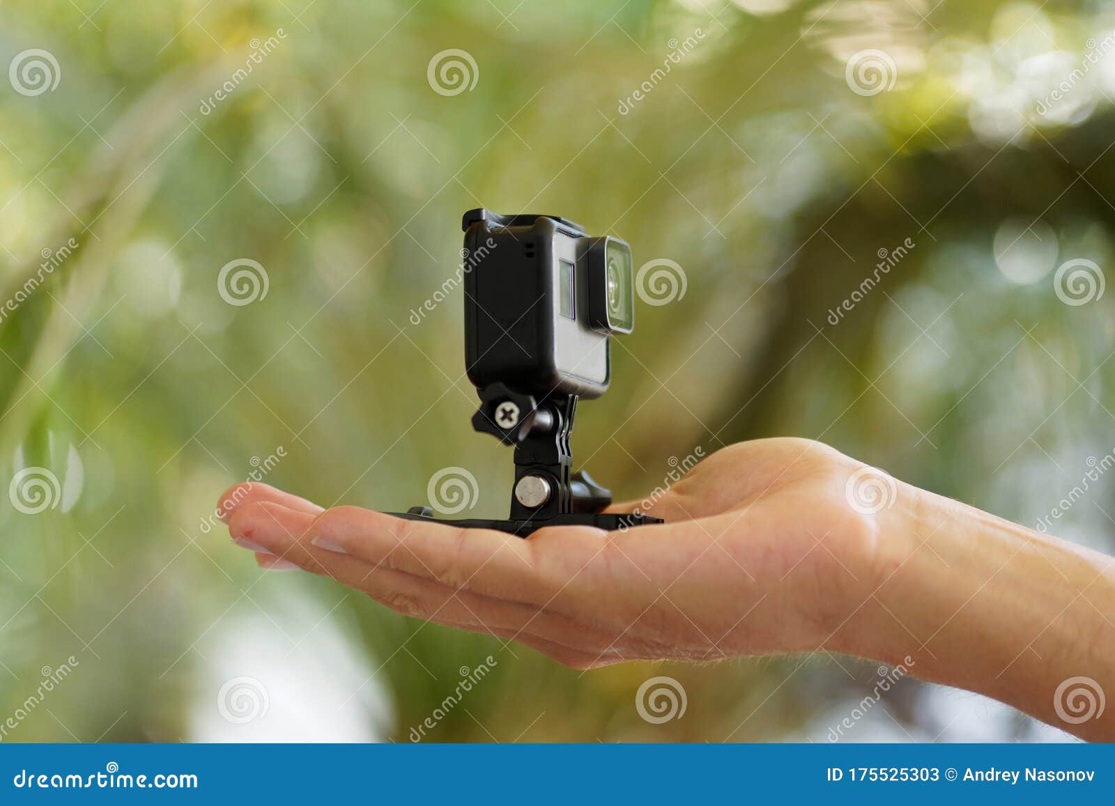 Action camera in man hand. stock image. Image of streaming - 175525303