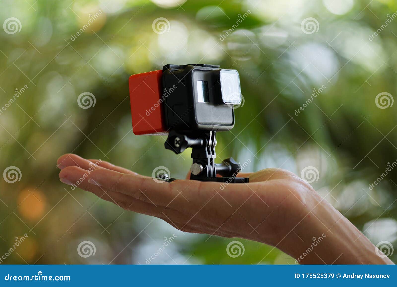 Action Camera with Orange Float in Man Hand . Stock Image - Image of ...