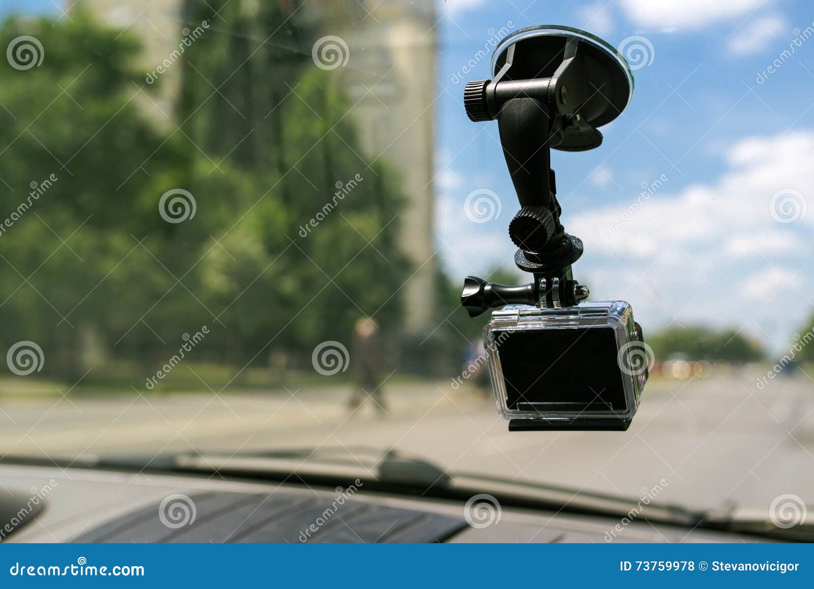 Action Camera with Suction Cap on Car Windshield Window Stock Photo ...