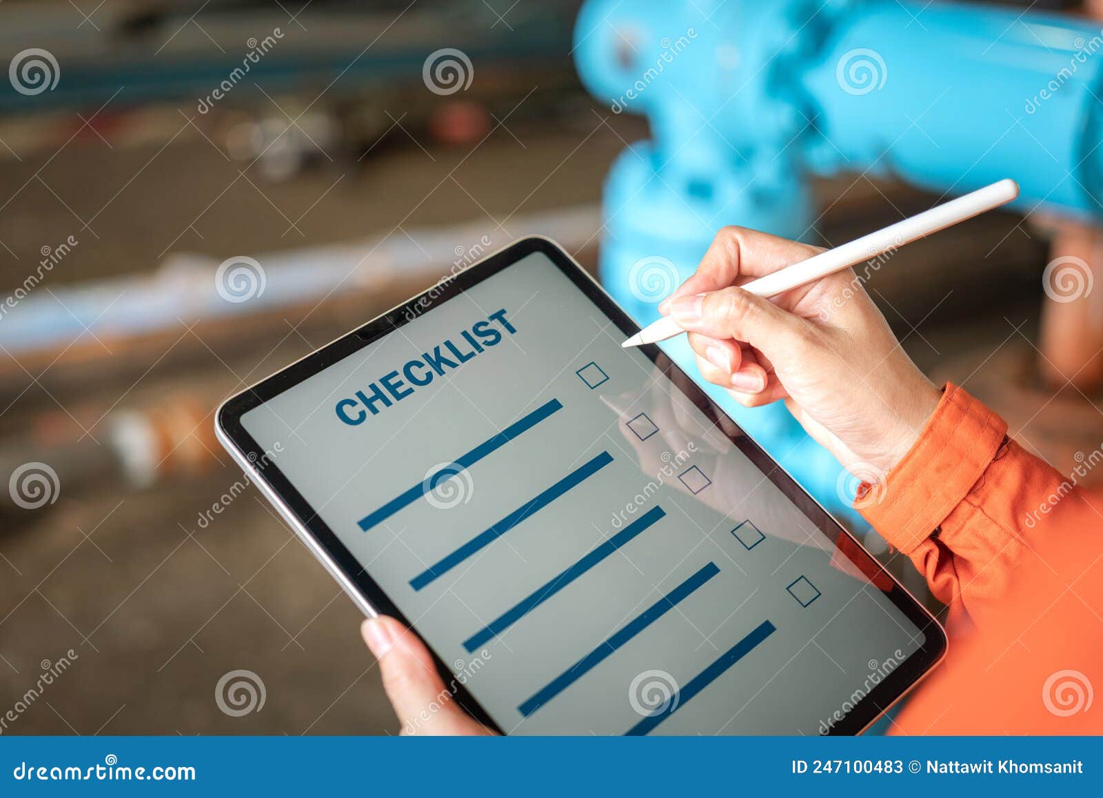 Checking a Safety Checklist on Tablet - Industrial Working with ...