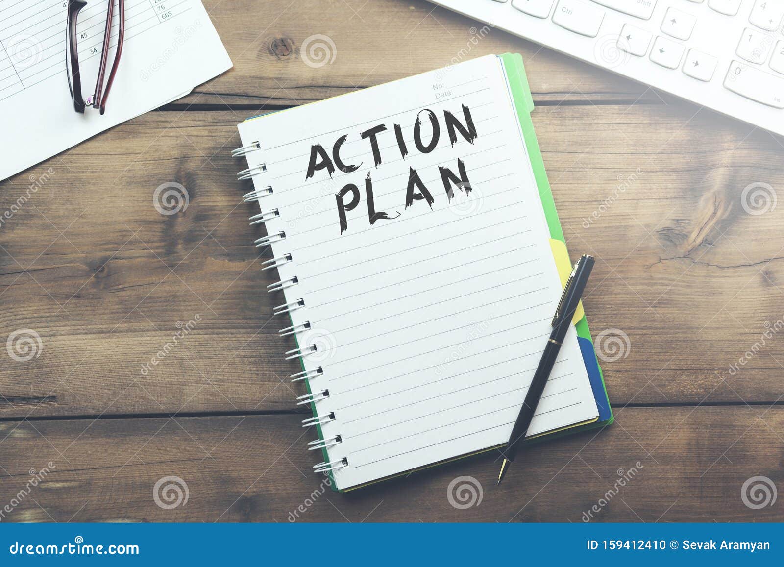 Action Plan Text on Notebook with Keyboard and Glasses on Table Stock ...