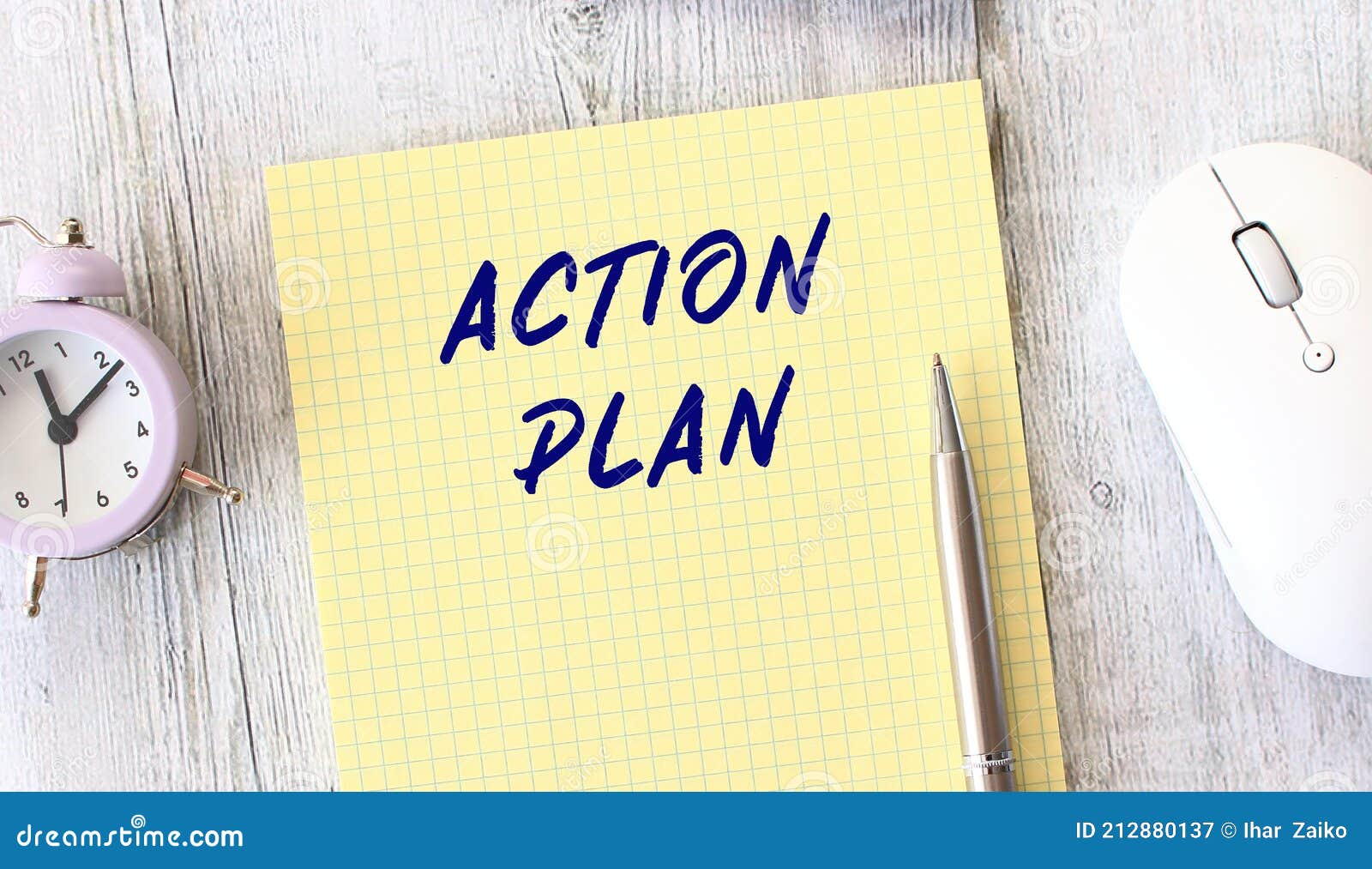ACTION PLAN Text Written in a Notebook Lying on a Wooden Work Table ...