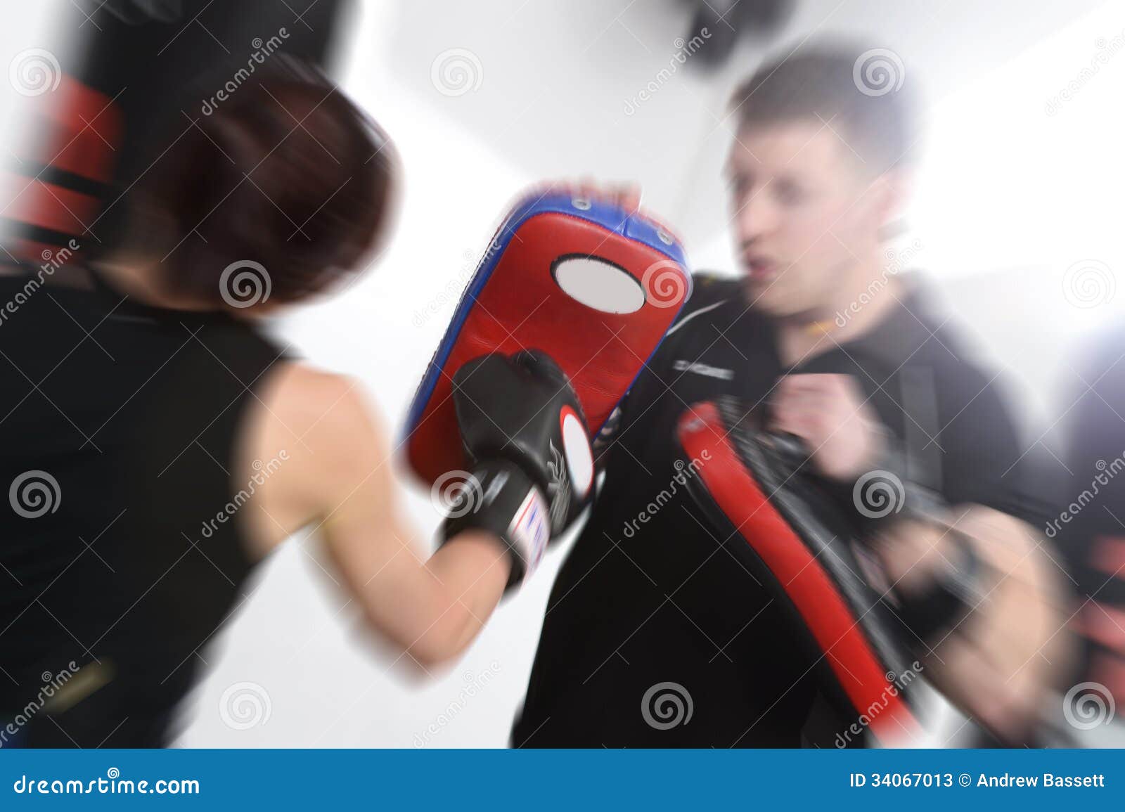 Action Shot Punching the Pads Stock Image - Image of male, instructor ...