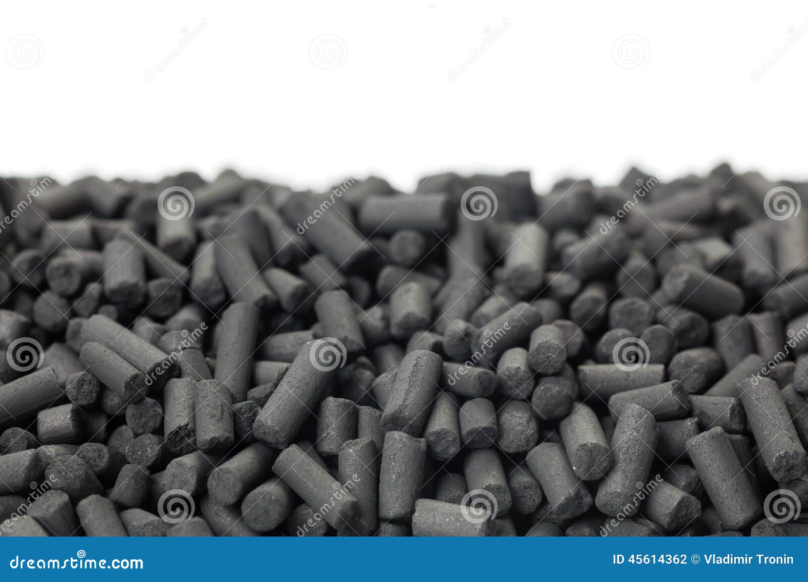 Activated Carbon Pill In Wood Spoon On Charcoal Texture Royalty-Free ...