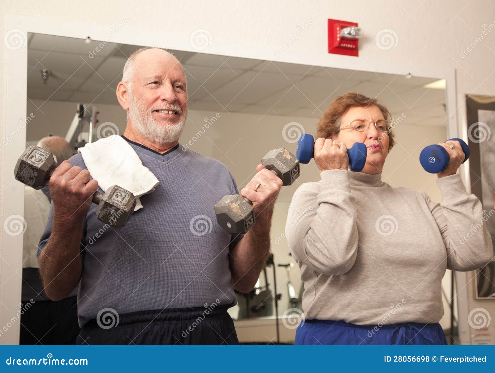 Active Adult Couple Working Out in the Gym Stock Photo - Image of ...